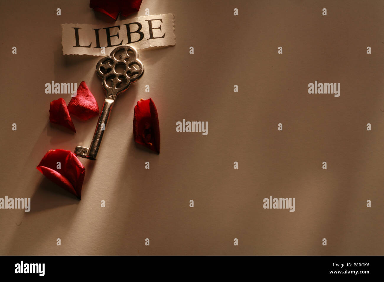 Picture of a symbolic key with notice Stock Photo - Alamy