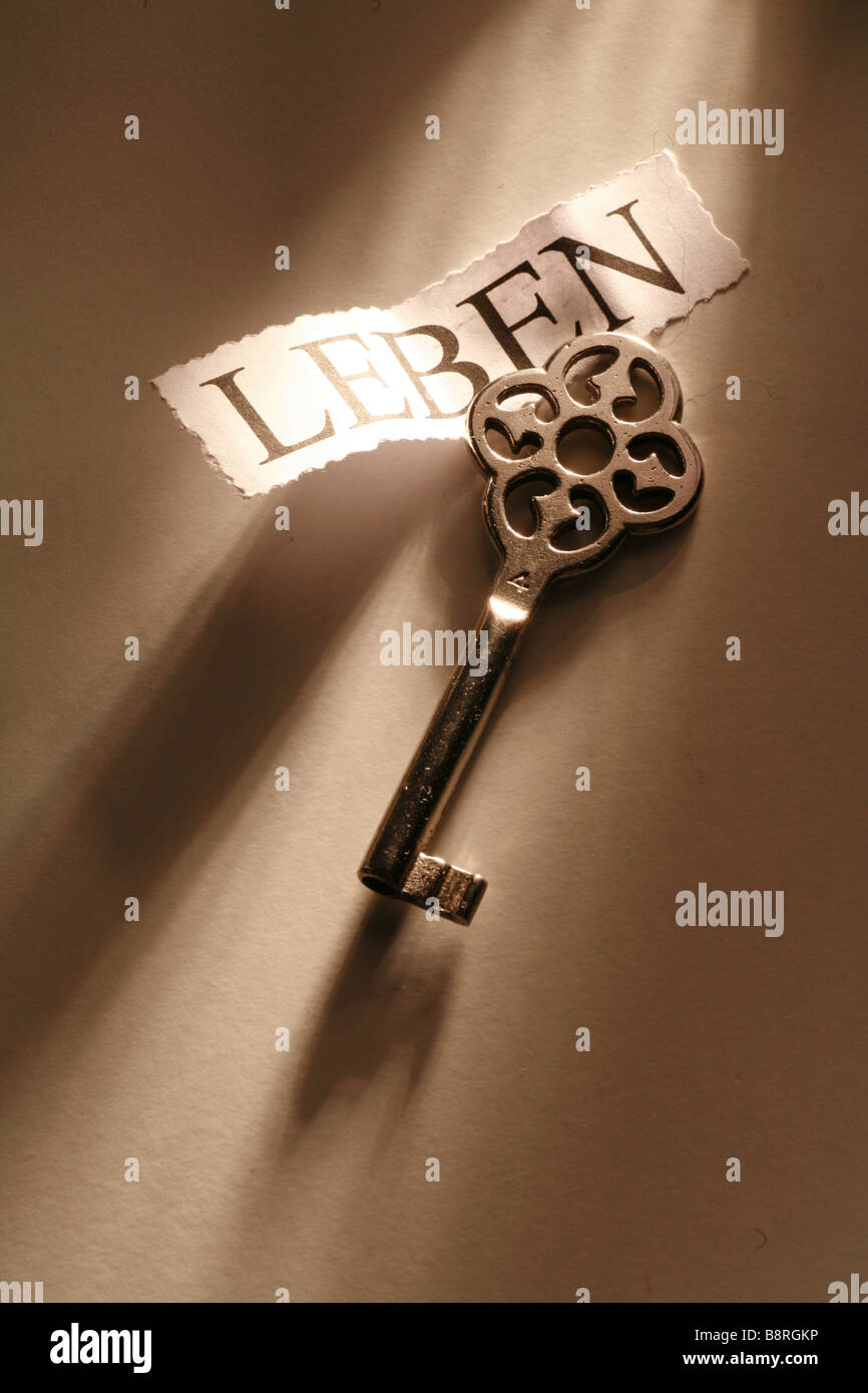 Picture of a symbolic key with notice Stock Photo - Alamy