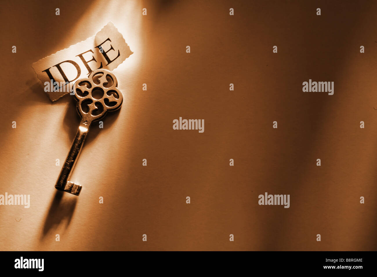 Picture of a symbolic key with notice Stock Photo - Alamy