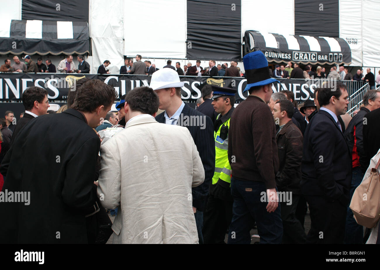 Cheltenham Gold Cup Guinness Village, crowded fans drinking amongst the ...