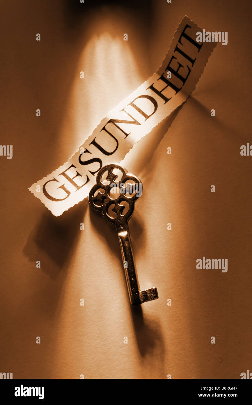 Picture of a symbolic key with notice Stock Photo - Alamy