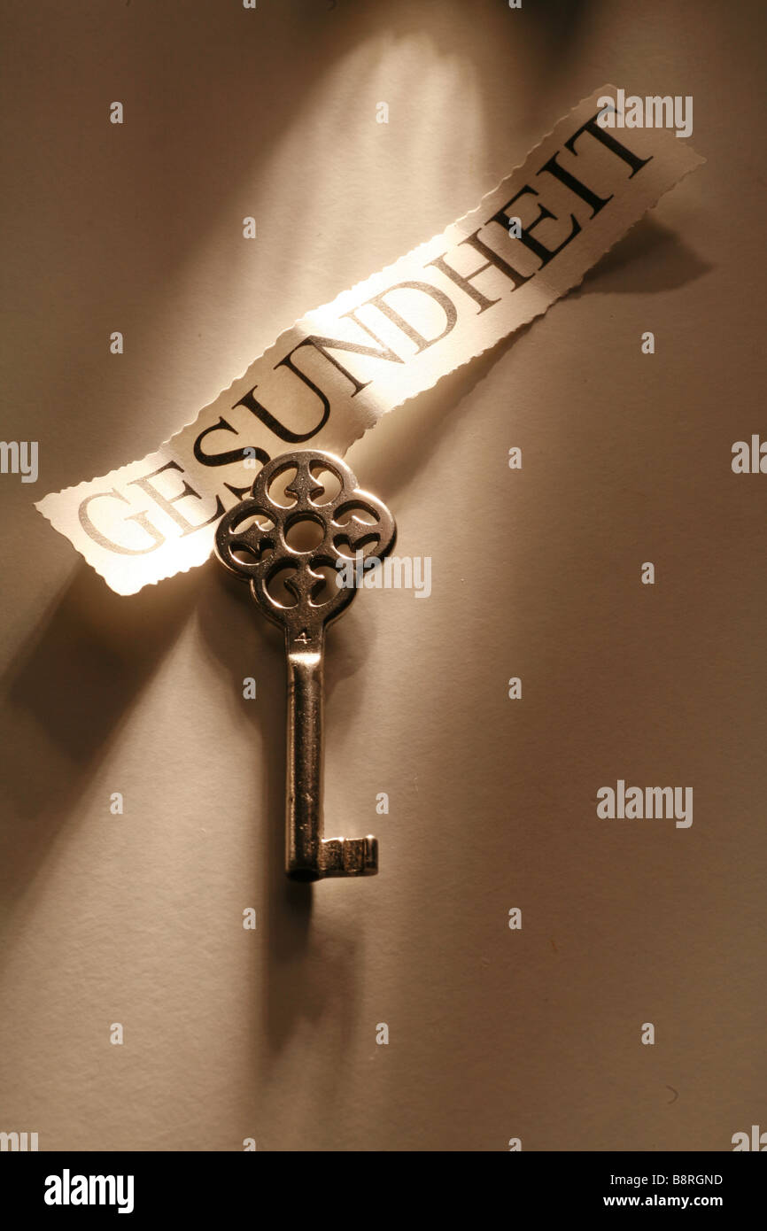 Picture of a symbolic key with notice Stock Photo - Alamy