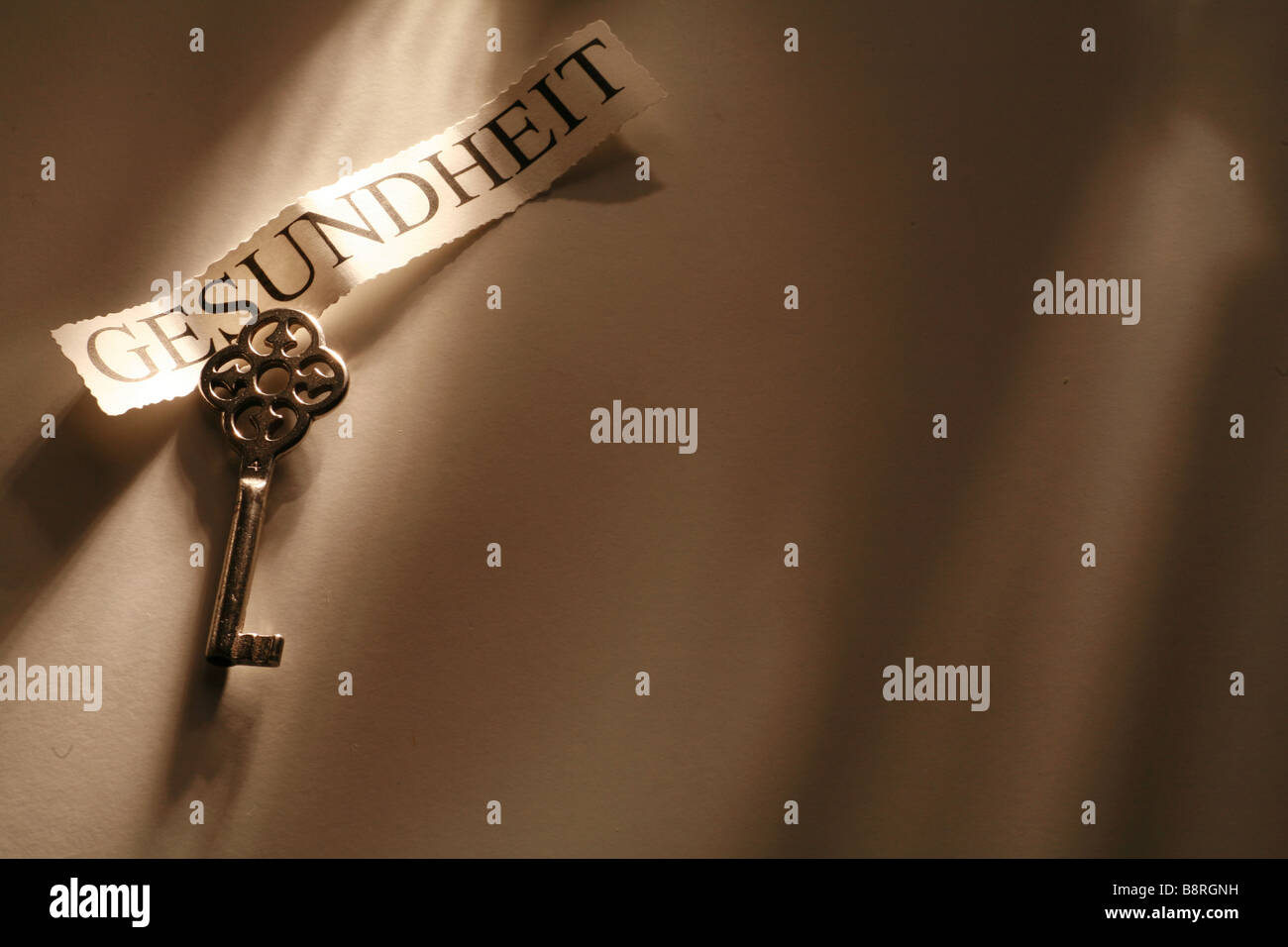 Picture of a symbolic key with notice Stock Photo - Alamy