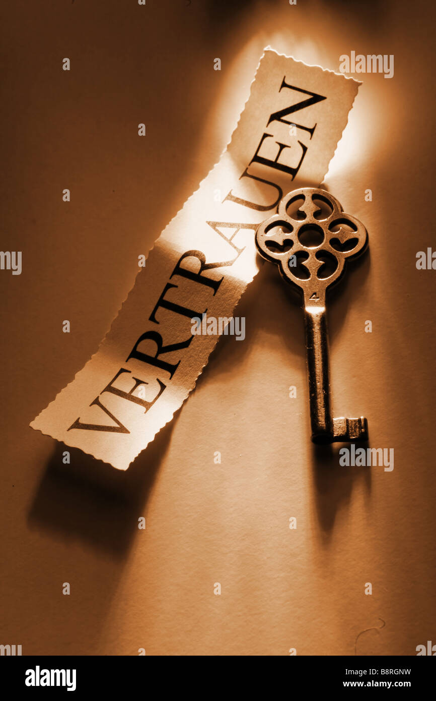 Picture of a symbolic key with notice Stock Photo - Alamy