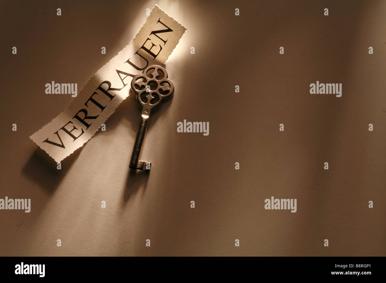 Picture of a symbolic key with notice Stock Photo - Alamy