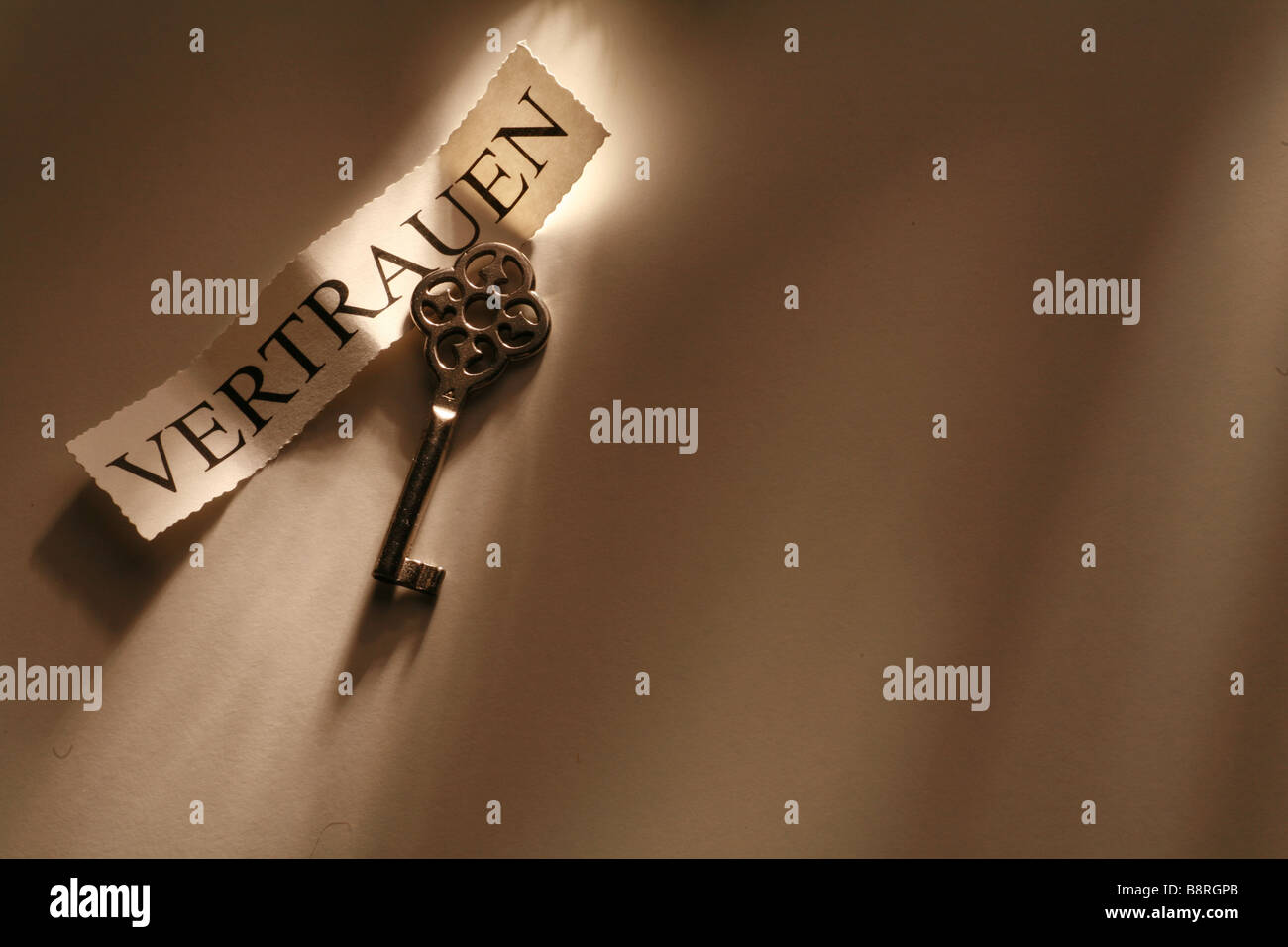 Picture of a symbolic key with notice Stock Photo - Alamy