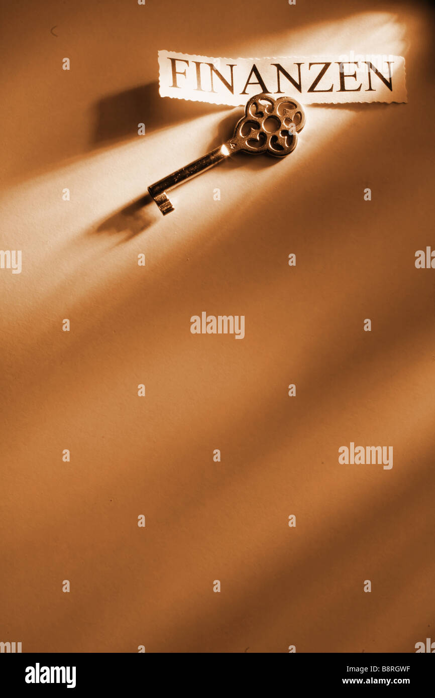 Picture of a symbolic key with notice Stock Photo - Alamy