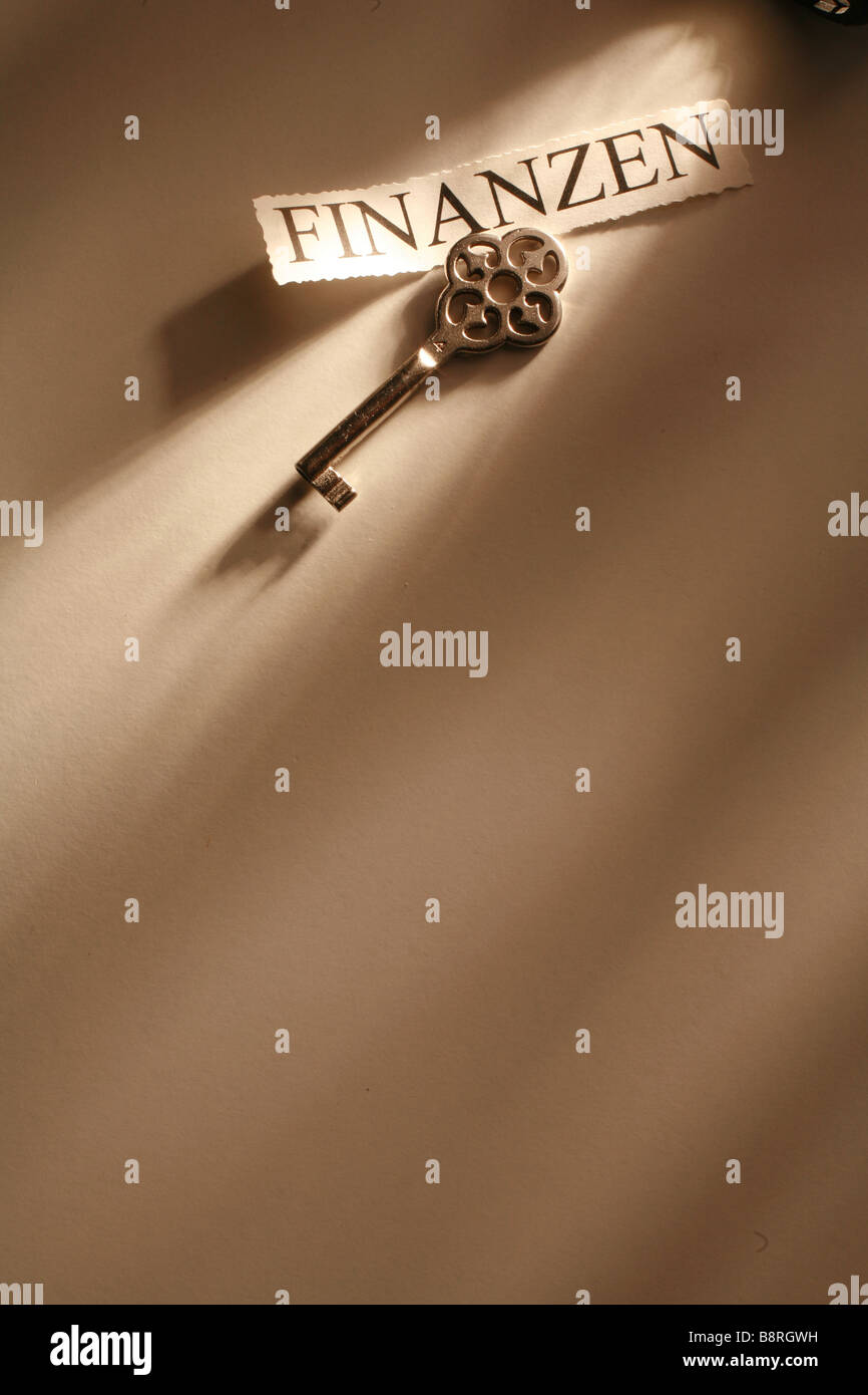 Picture of a symbolic key with notice Stock Photo - Alamy