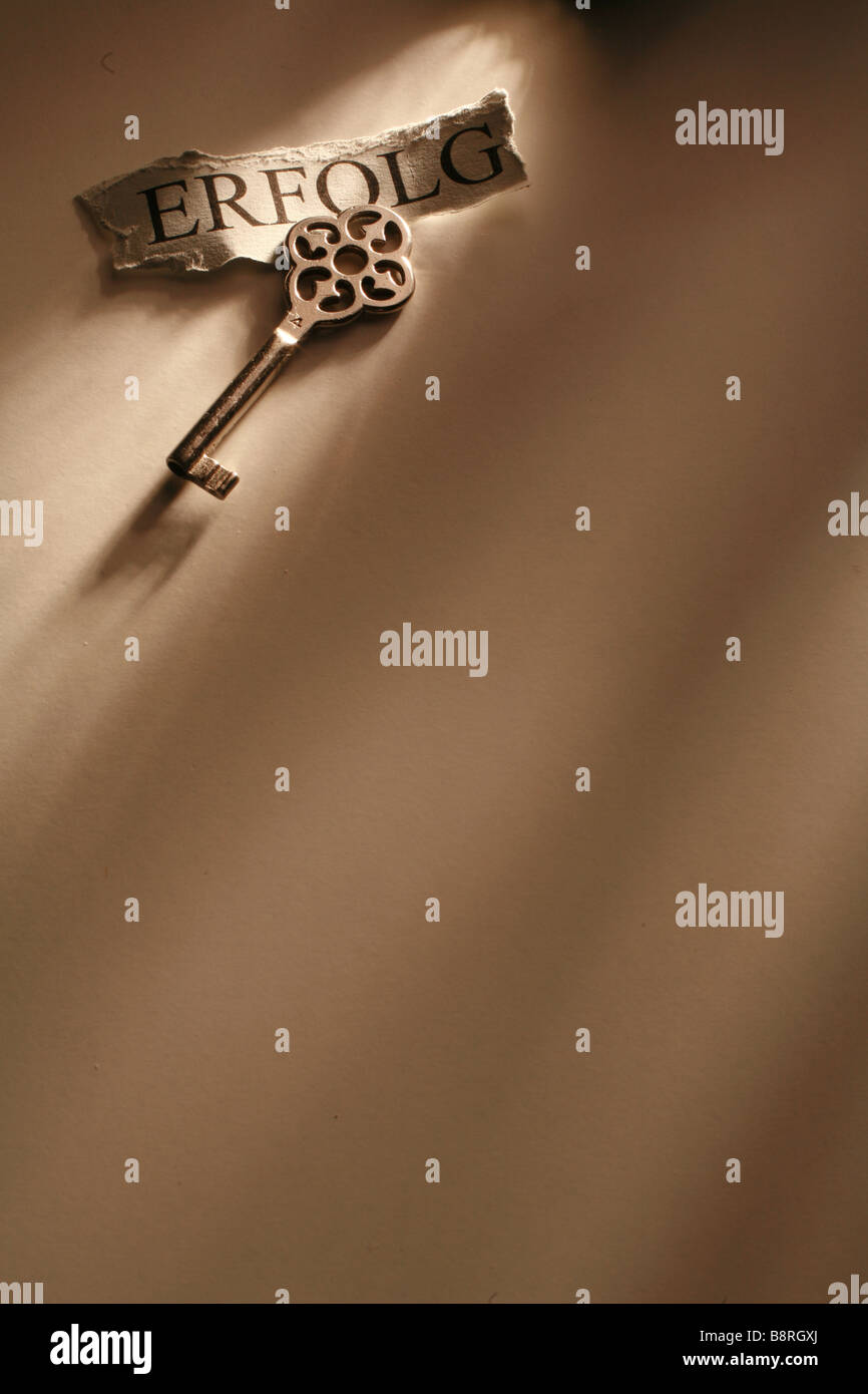 Picture of a symbolic key with notice Stock Photo - Alamy