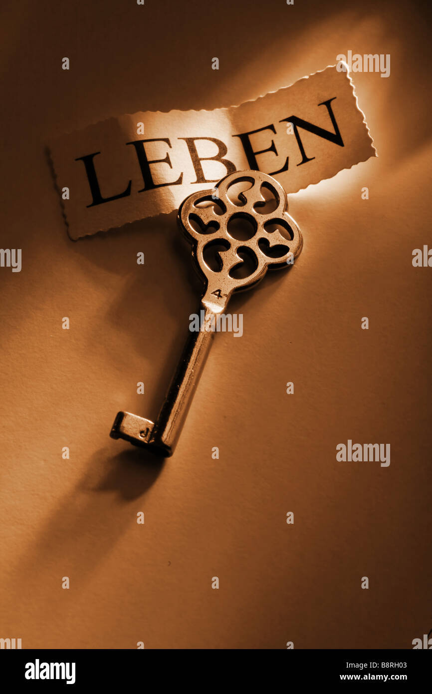 Picture of a symbolic key with notice Stock Photo - Alamy