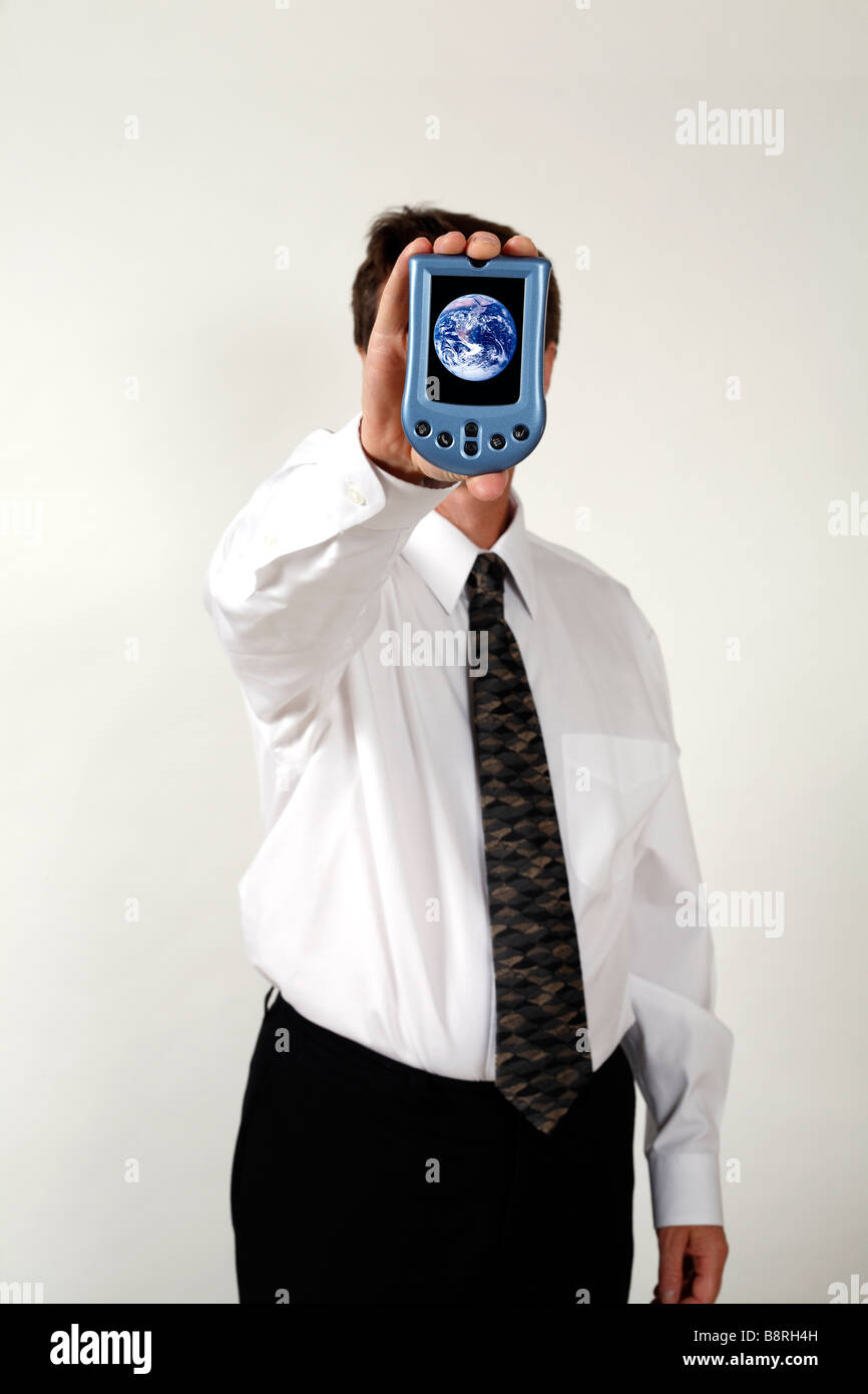 Business man with personal data device displaying planet earth Stock ...