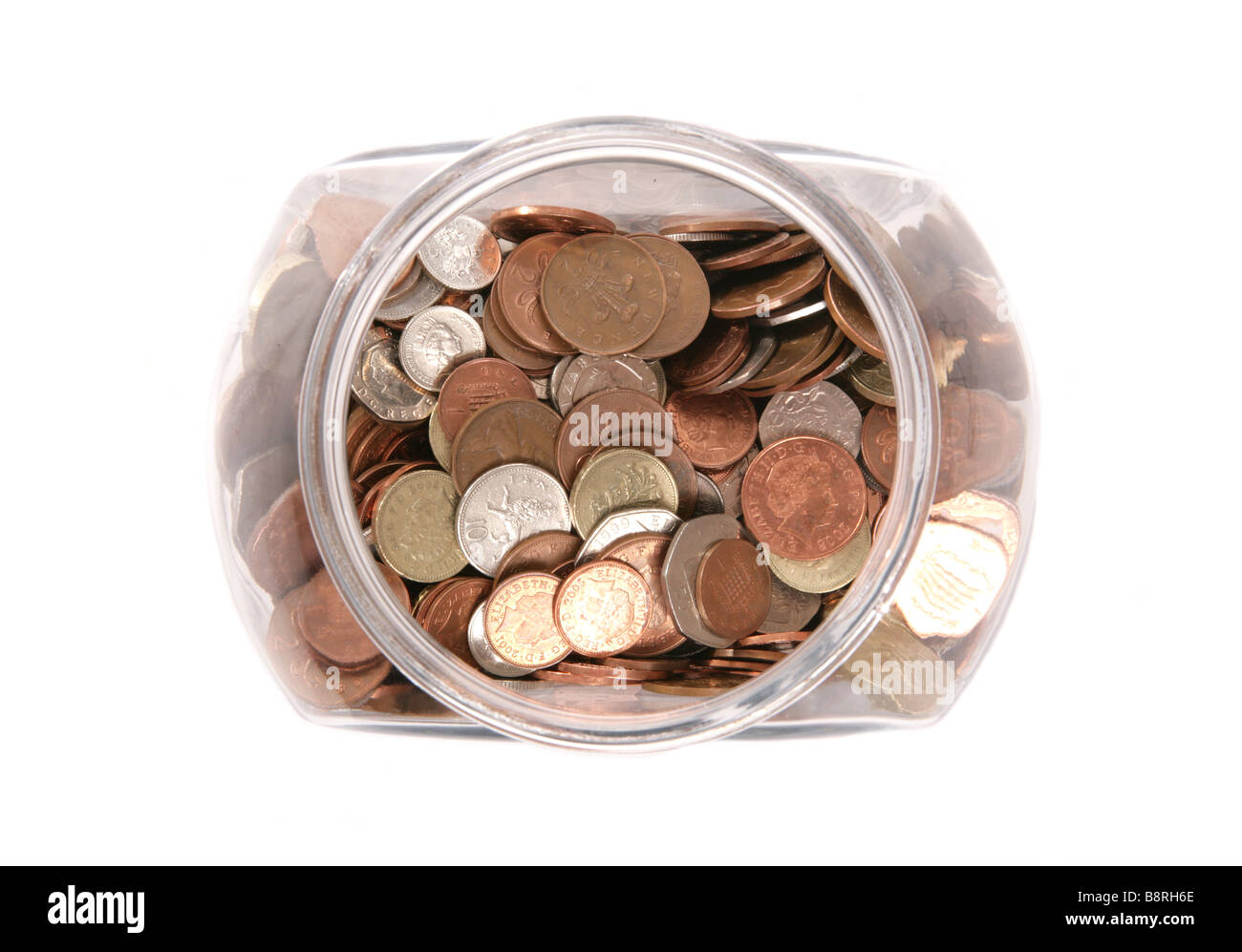 Pot of english money in studio Stock Photo - Alamy