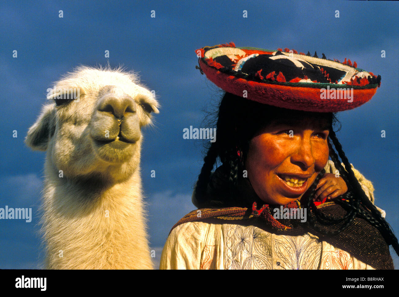 Peruvian Indian woman, her child and her llama in Cusco, Peru Stock ...