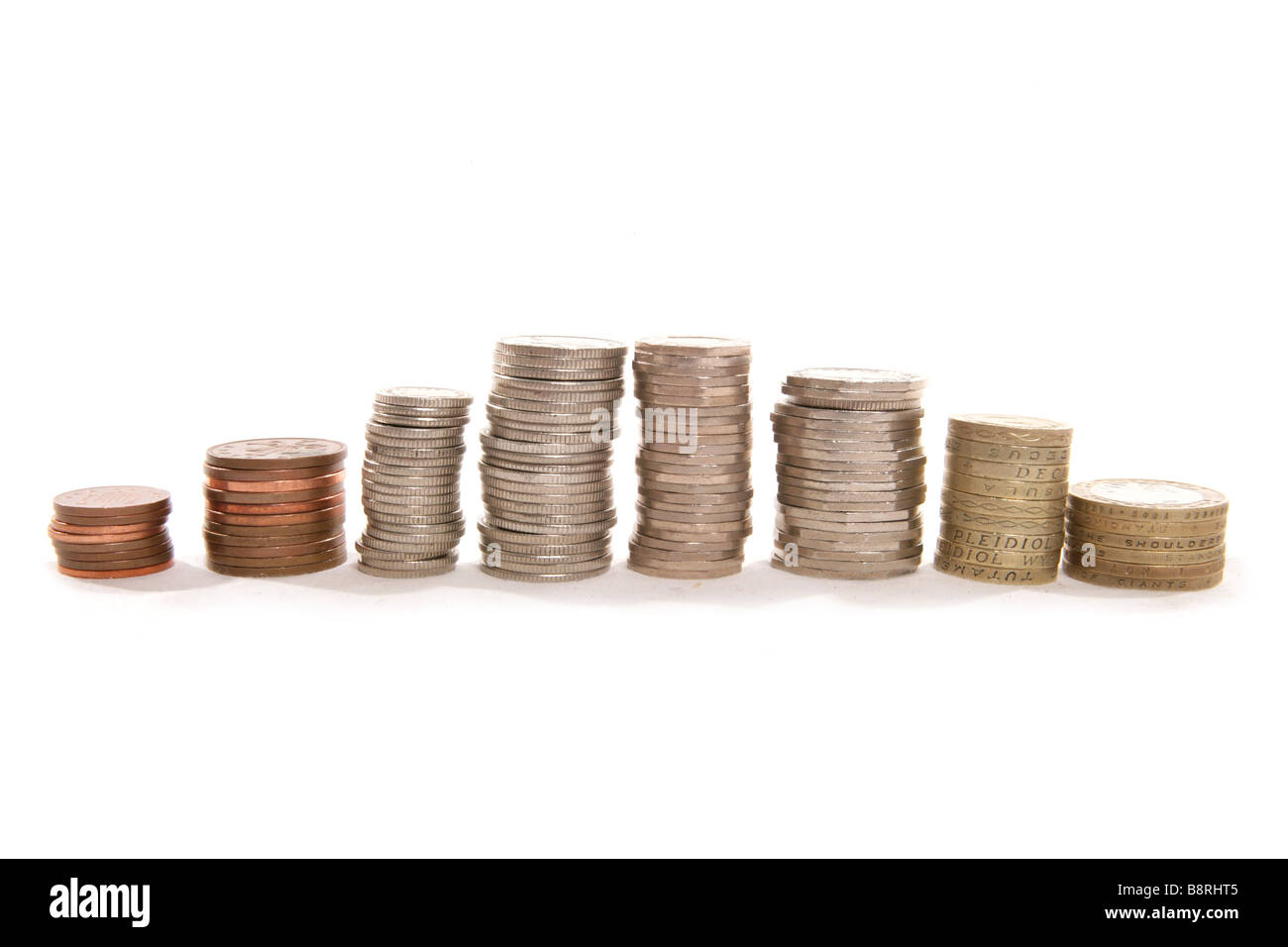 Stacks of english money in studio Stock Photo - Alamy