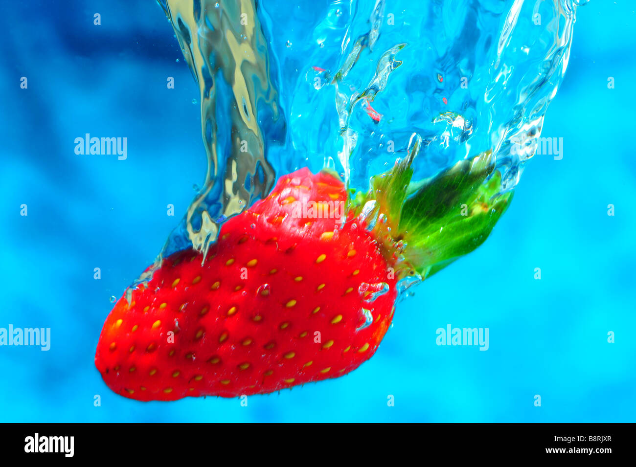 Strawberry Splash in Water Stock Photo - Alamy