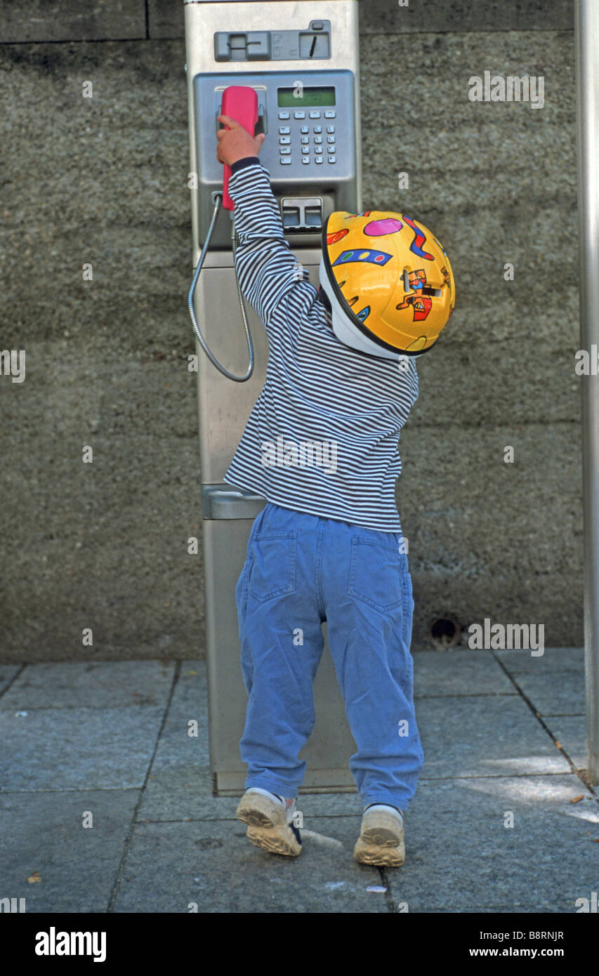 Back view boy on bicycle hi-res stock photography and images - Alamy