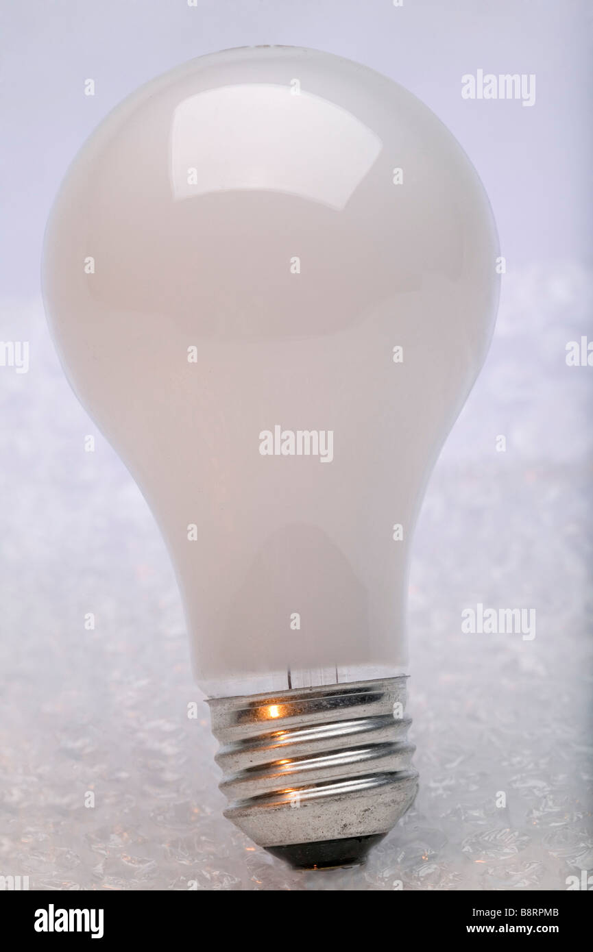 A single incandescent light bulb Stock Photo - Alamy