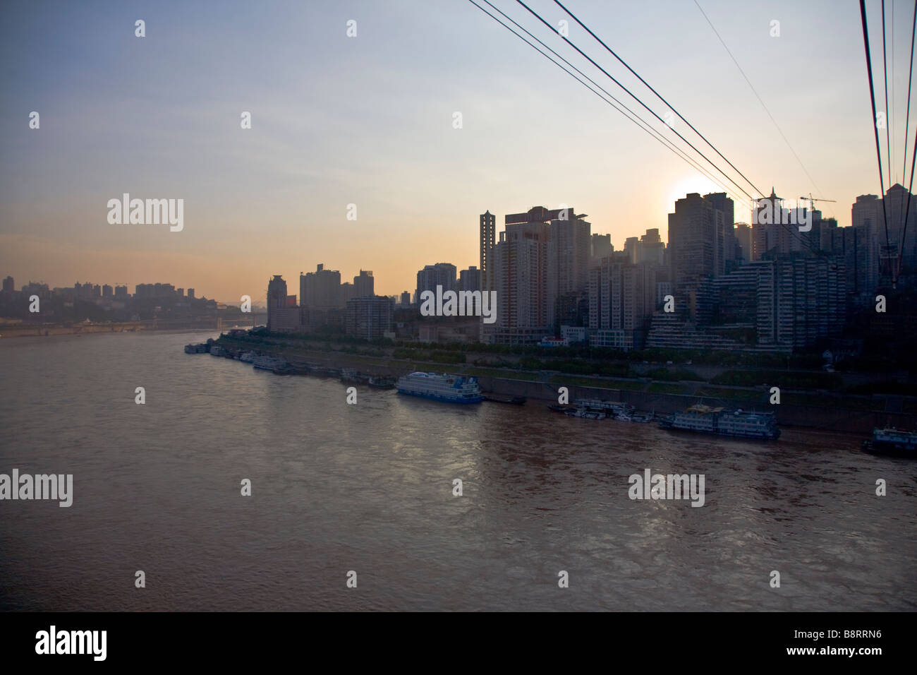 Sunset on the Yangtze river and Chonqing City skyline viewed from the ...