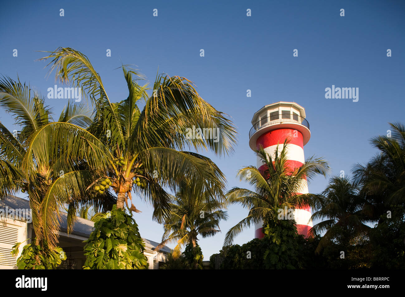 Bahamas Grand Bahama Island Freeport Setting sun lights lighthouse ...