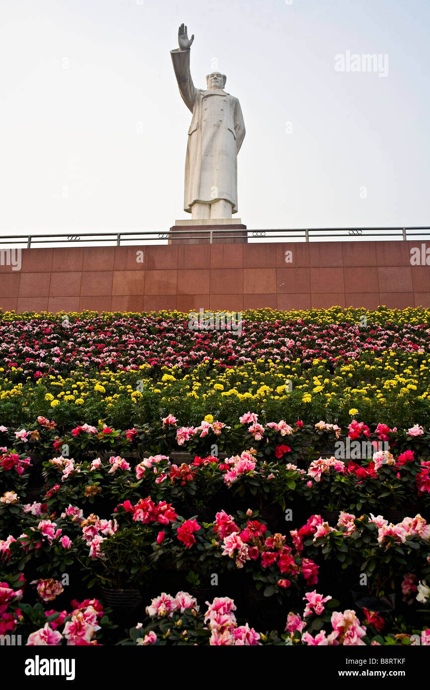 Flowers honoring chariman Mao's statue in Chengdu, Sichuan Province ...