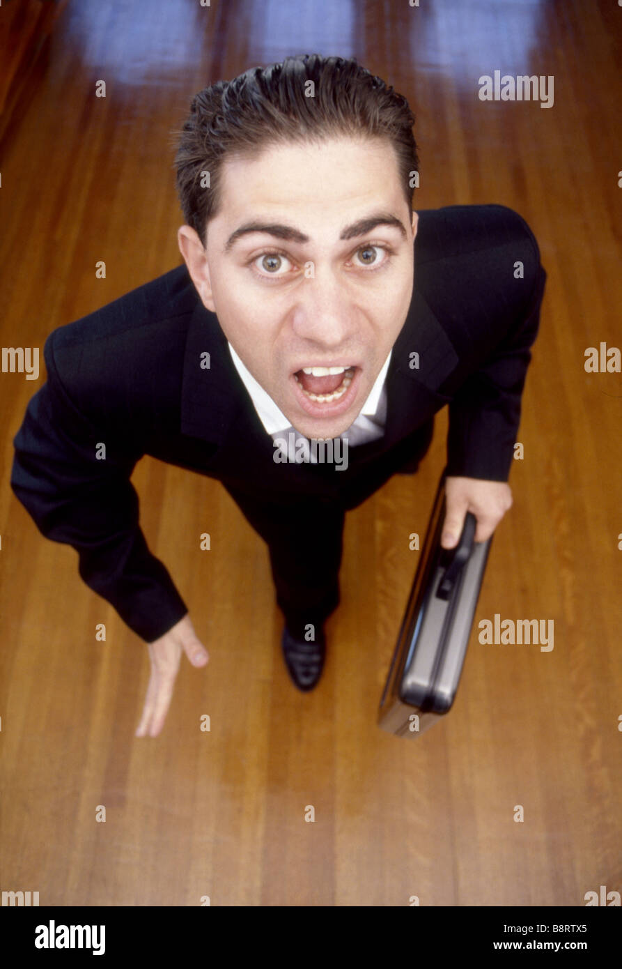 Business man rushing to work Stock Photo - Alamy