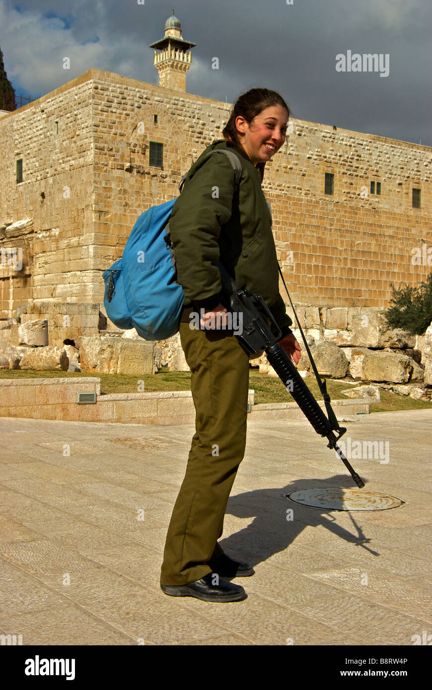 Pretty young female Israeli army conscript carrying unloaded M16 ...