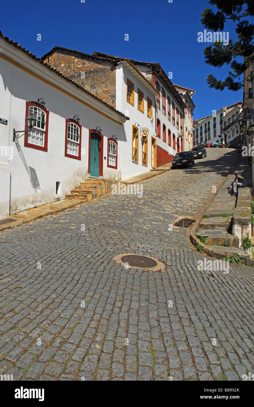 A cobbled side street in the historic, colonial gold mining town of ...