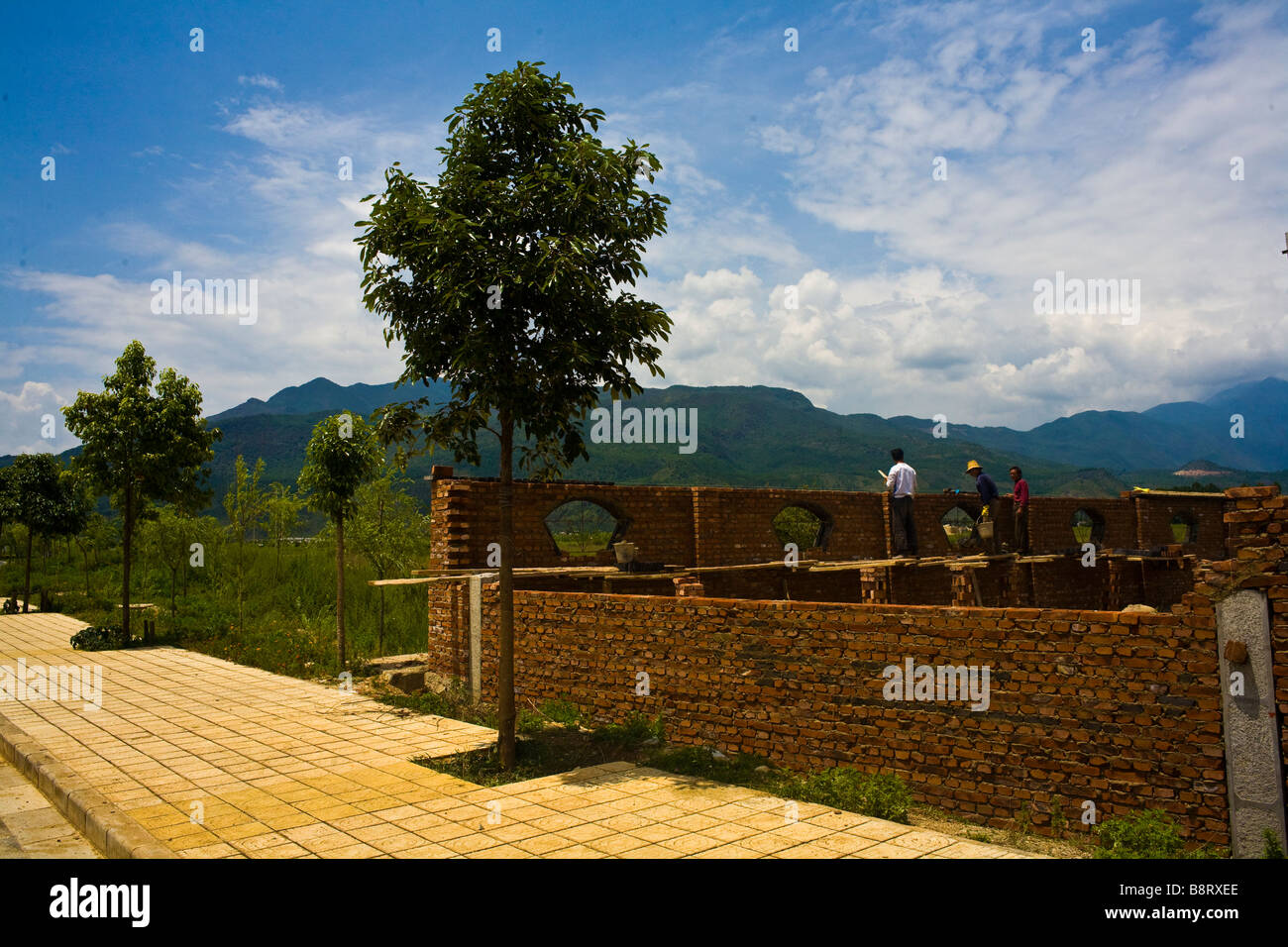 Bricklayers in the countryside around Lijiang, Yunnan Province, China ...