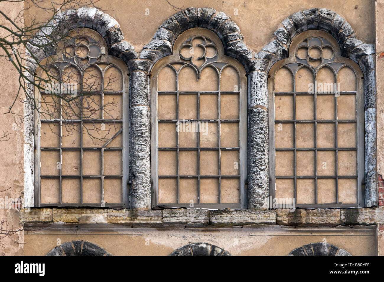 Triple gothic false windows on castle wall Stock Photo - Alamy