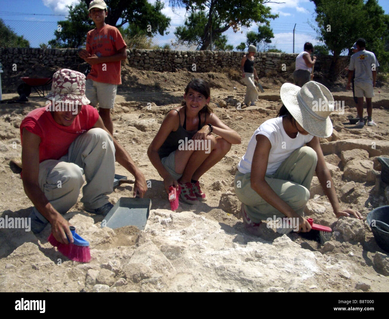 archaeological excavation in Pollentia, young people digging in the ...