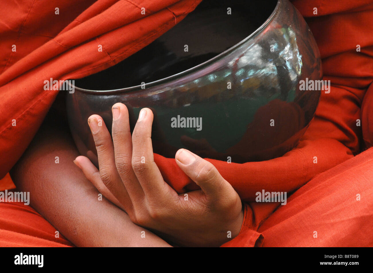 hands with begging pot, Burma Stock Photo - Alamy