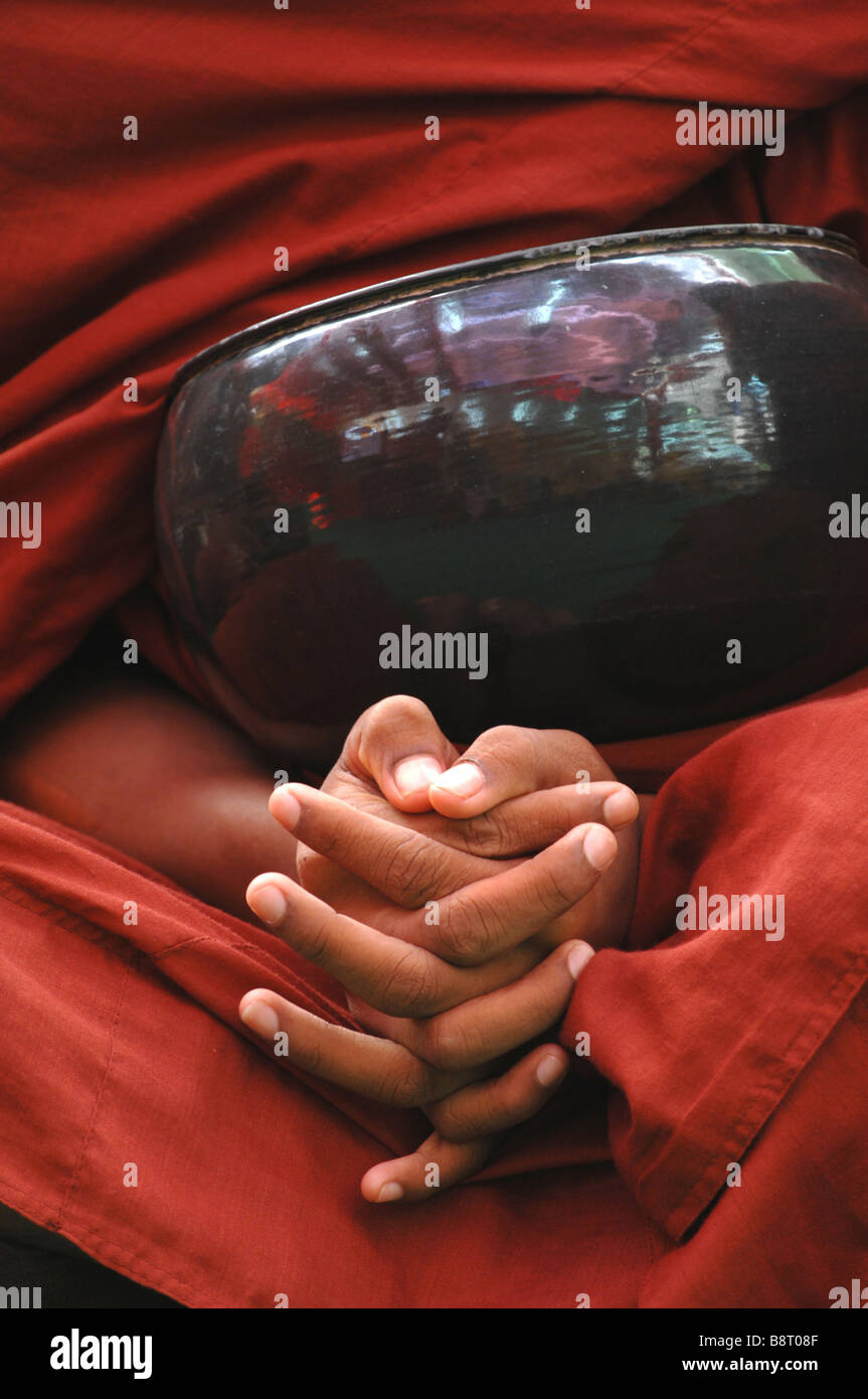 hands with begging pot, Burma Stock Photo - Alamy