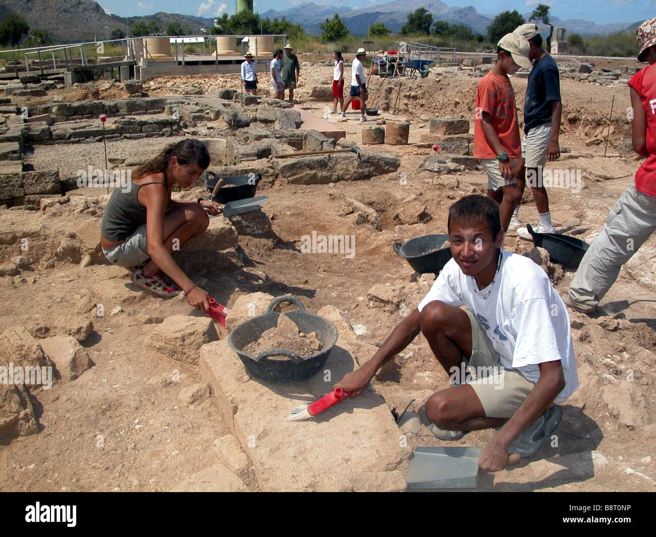 archaeological excavation in Pollentia, young people digging in the ...