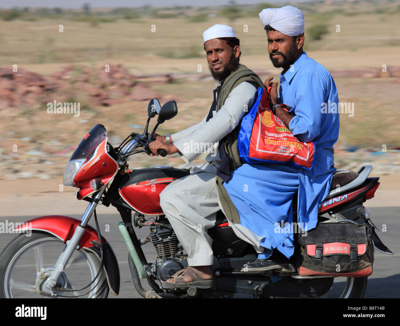 India Rajasthan men on motorcycle Stock Photo - Alamy