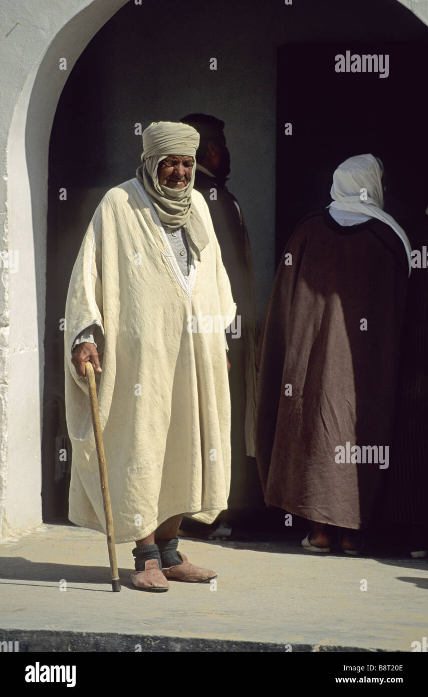 men standing in front of a house, Tunisia, Jerid, Oase Douz Stock Photo ...