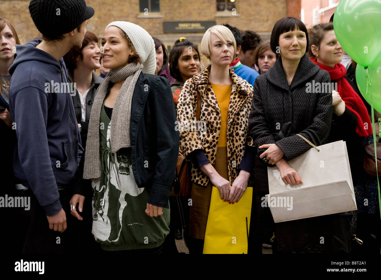 Clothes swapping event in London,Spitalfields Market.vPeople swap their ...