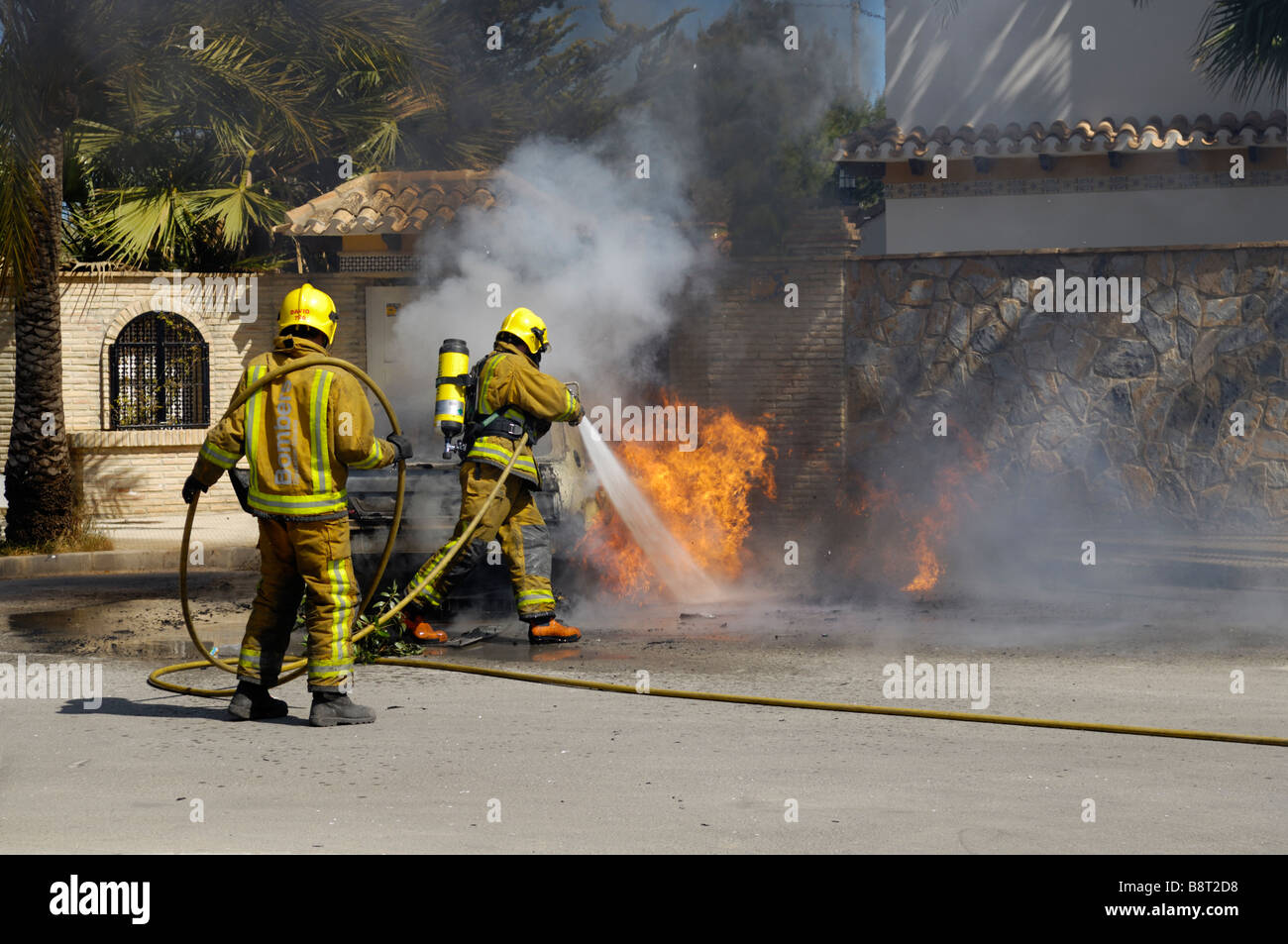 Spanish fire services attending a car fire Stock Photo - Alamy