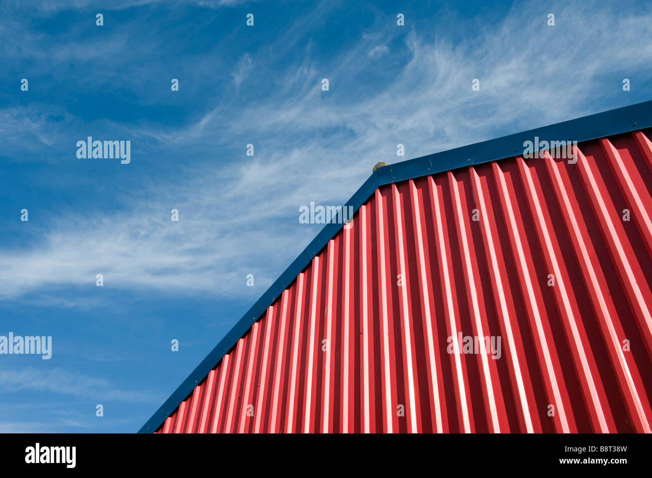 Red corrugated metal building Stock Photo - Alamy