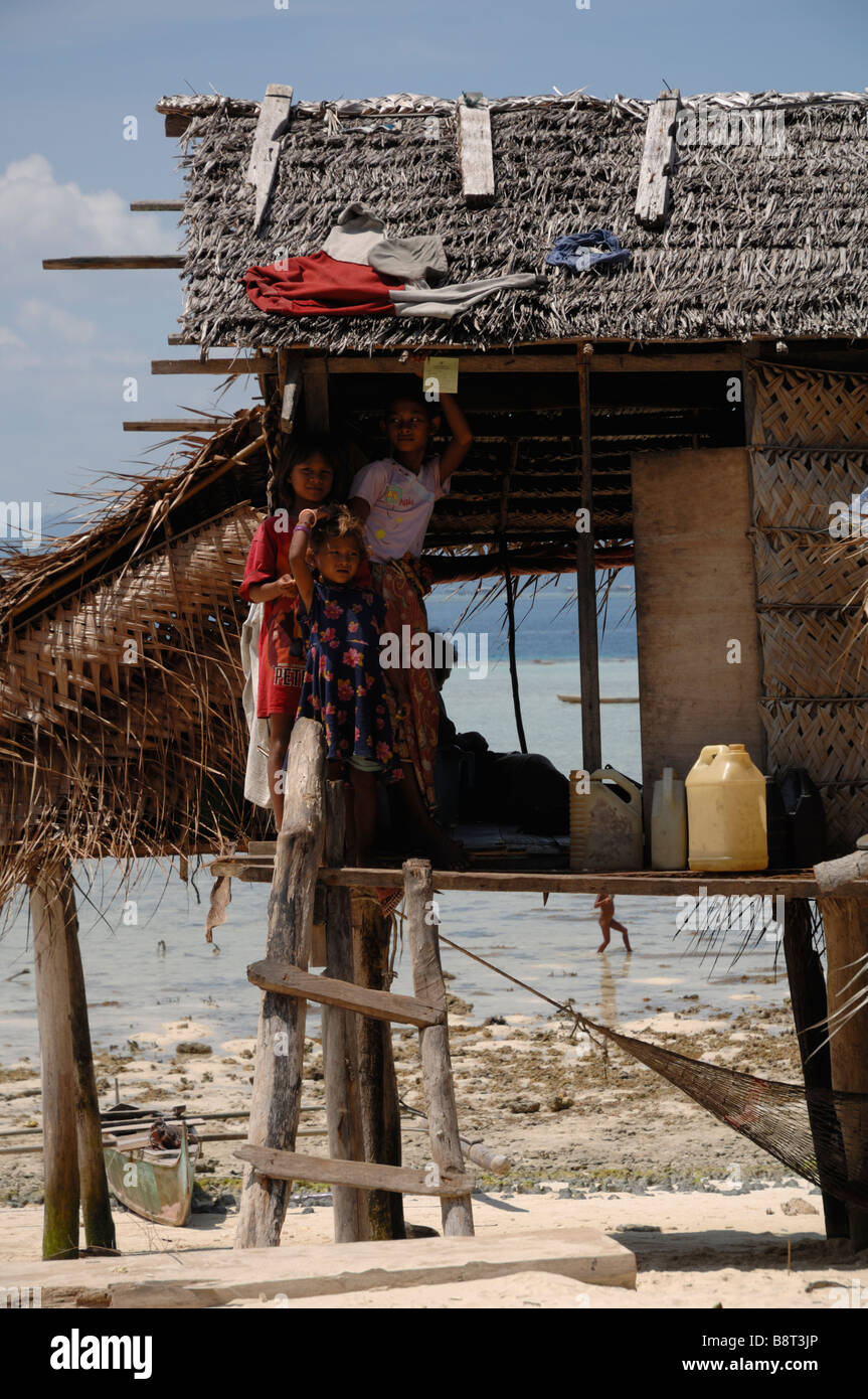 Bajau family and house on wooden stilts Pulau Maiga Semporna Sabah ...