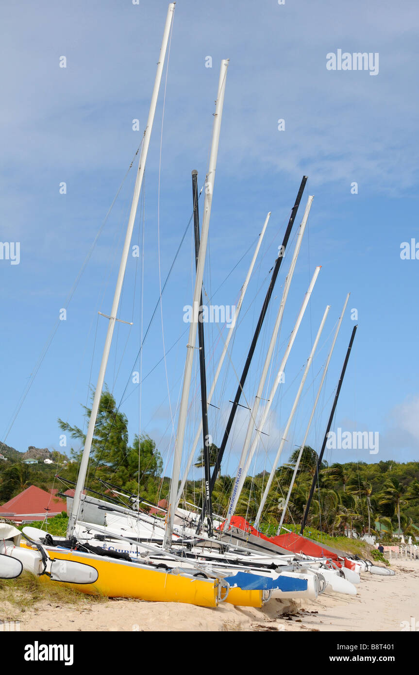 Boats lined up on the beach Stock Photo - Alamy