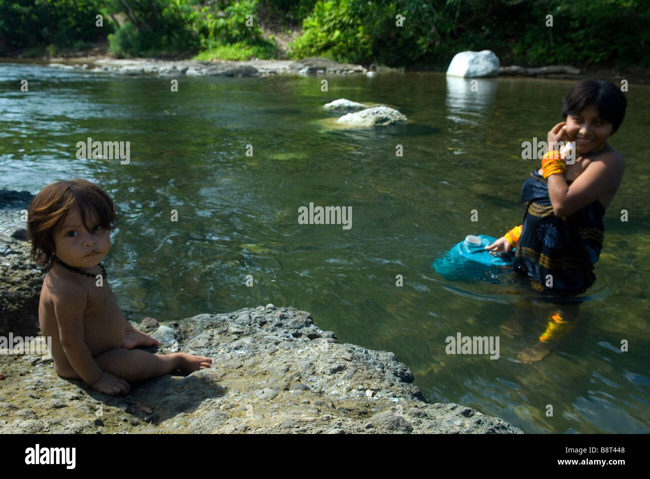 Kuna people bathing in the river at Wala village in Panama's Darien ...