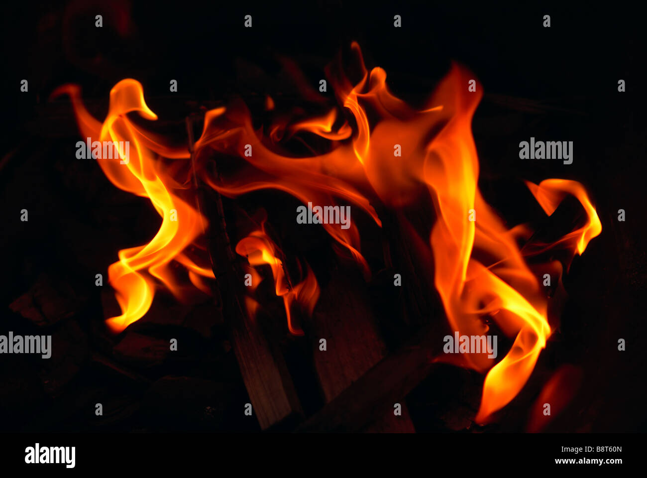 Inflaming fire in a fireplace Stock Photo - Alamy