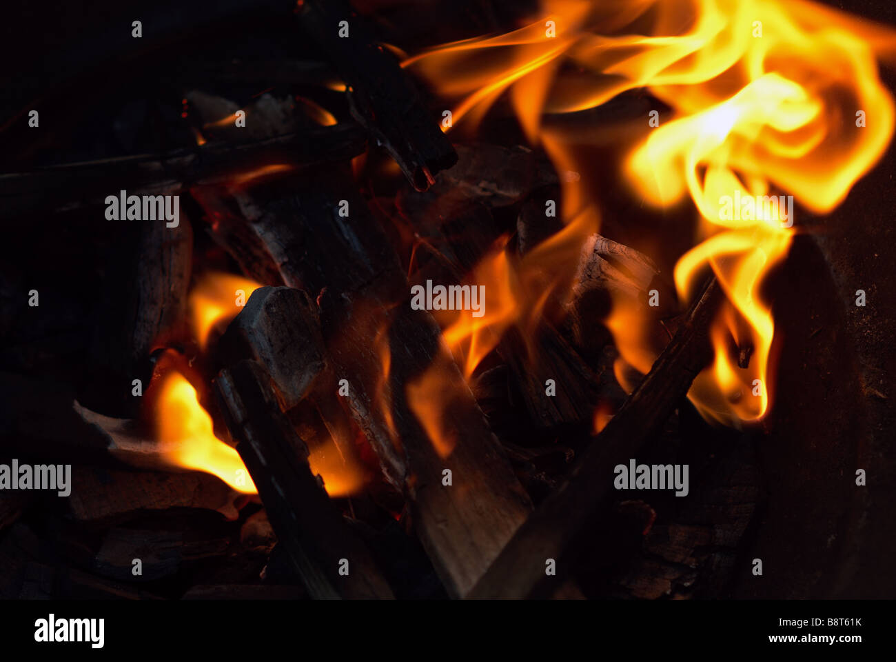 Inflaming fire in a fireplace Stock Photo - Alamy