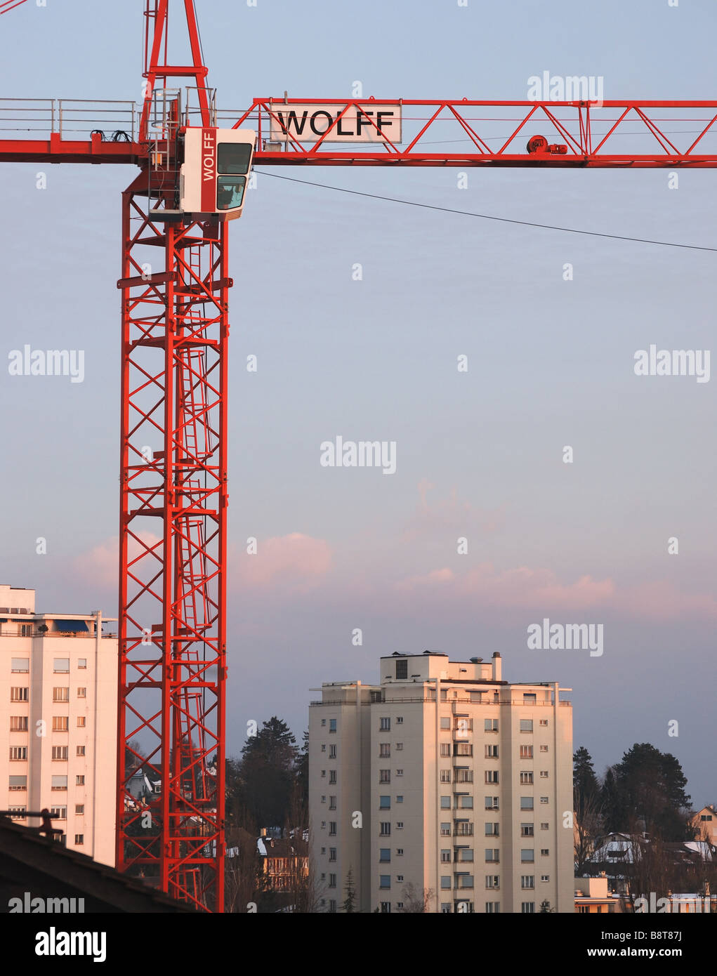Tower crane moving load hi-res stock photography and images - Alamy