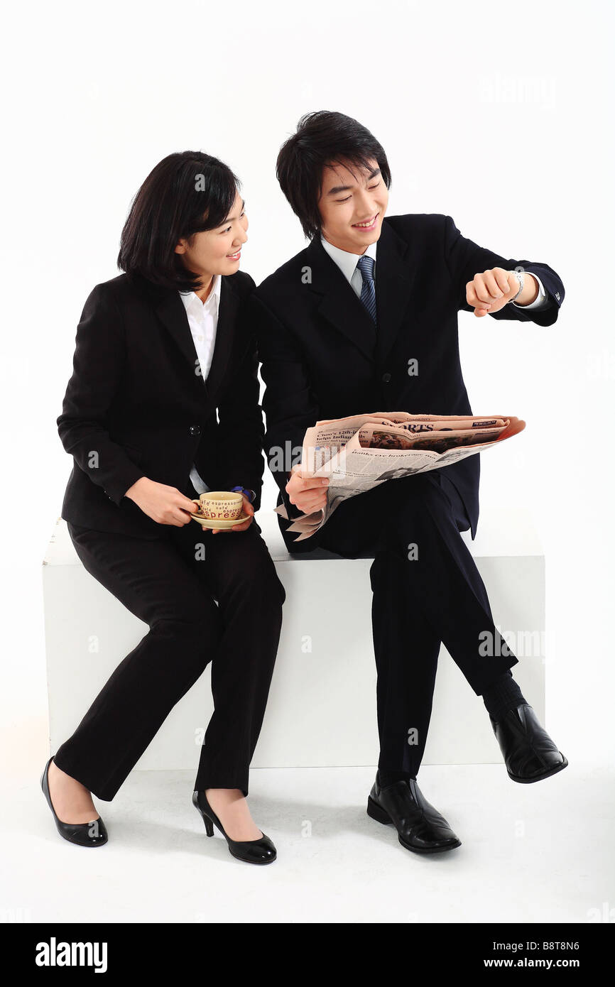 Young Business Couple Stock Photo - Alamy