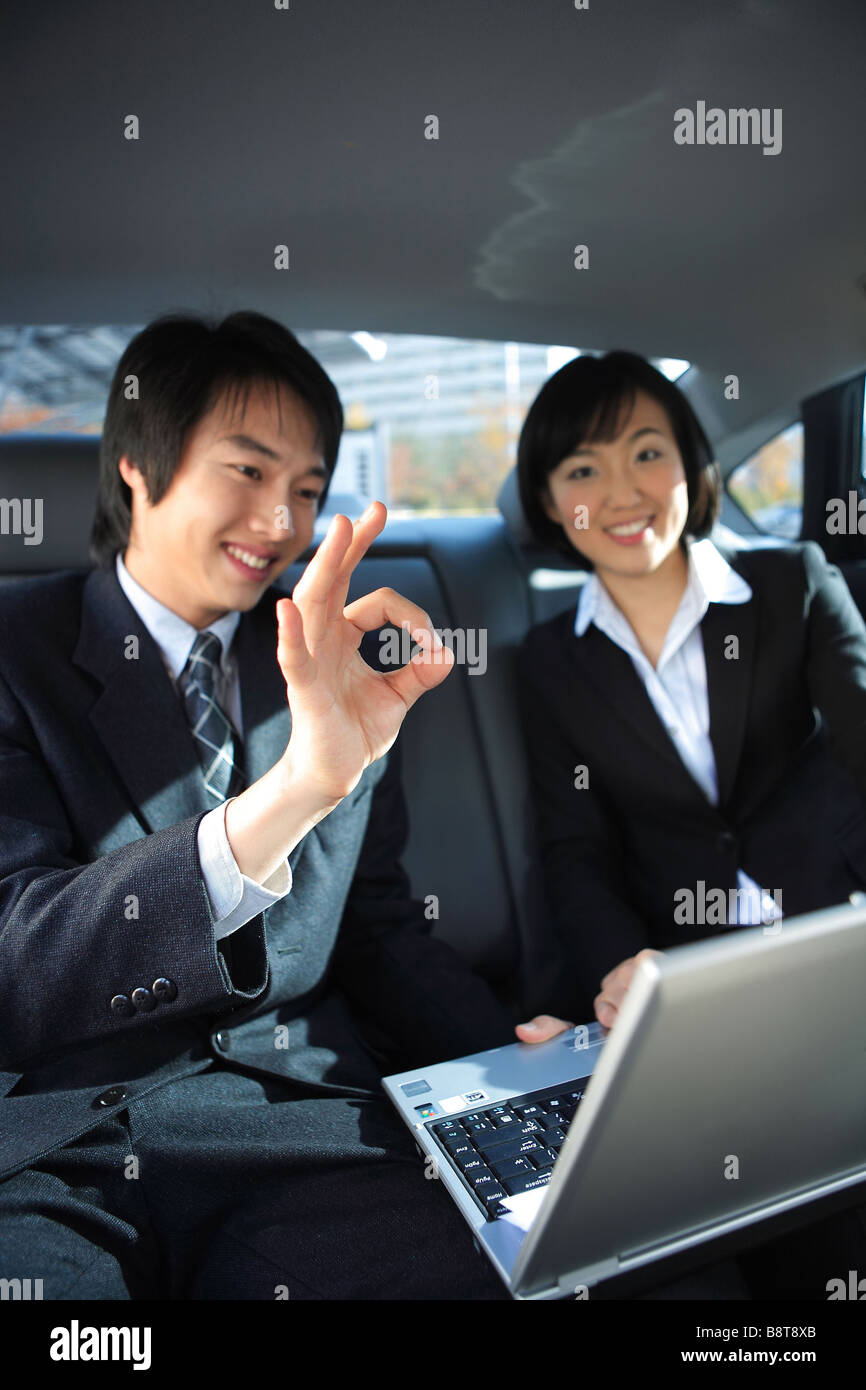 Young Business Couple Stock Photo - Alamy