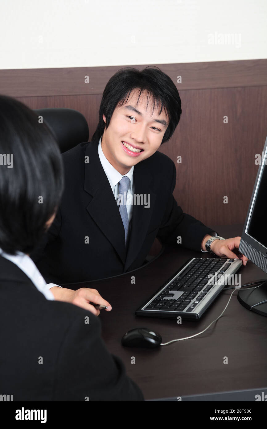 Young Business Couple Stock Photo - Alamy