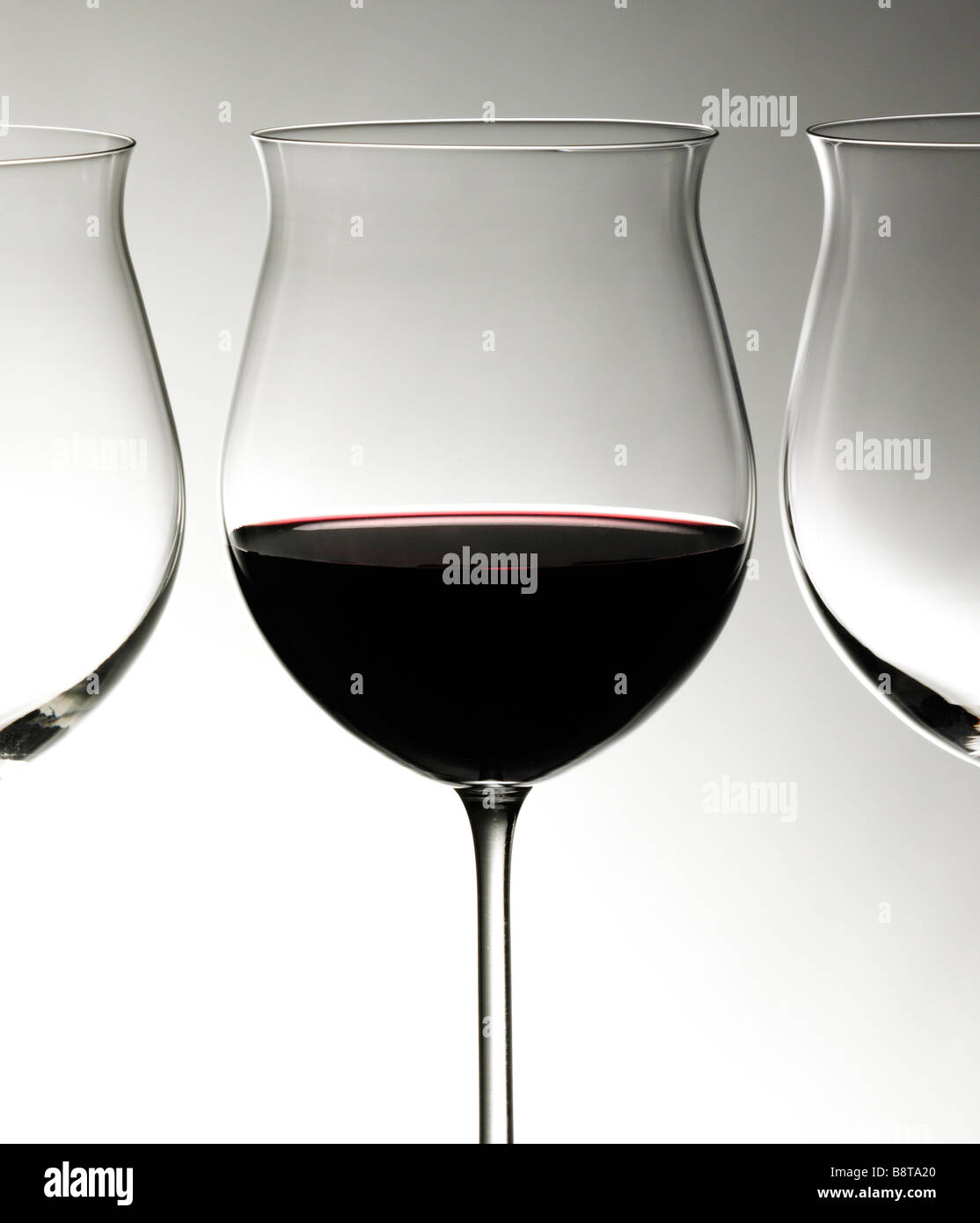 Crystal glasses with red wine Stock Photo - Alamy