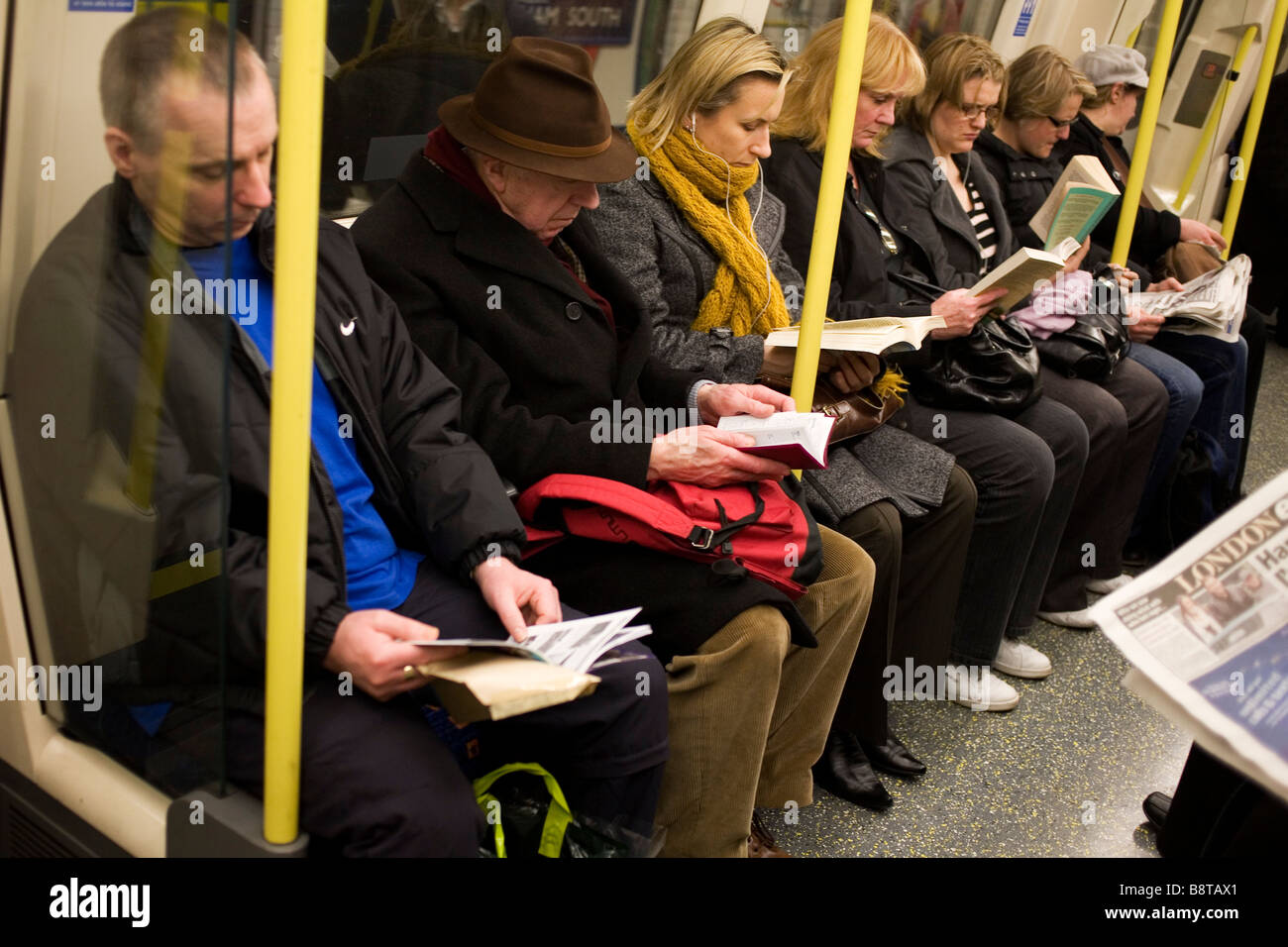 Sitting on tube train hi-res stock photography and images - Alamy