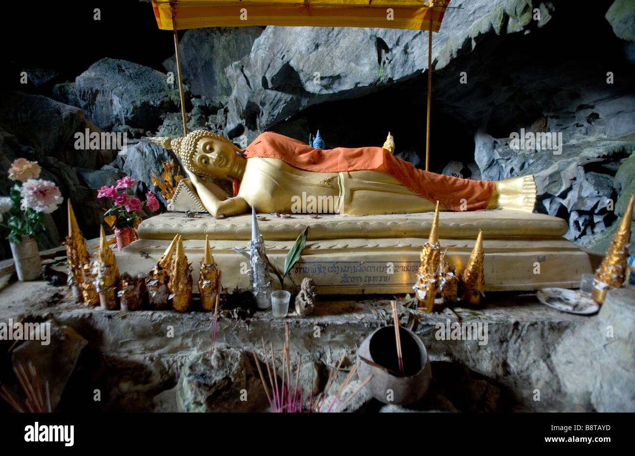 Laos, Vientiane Province, Vang Vieng. Limestone cave, reclining Buddha ... Laos, Vientiane Province, Vang Vieng. Limestone cave, reclining Buddha ...